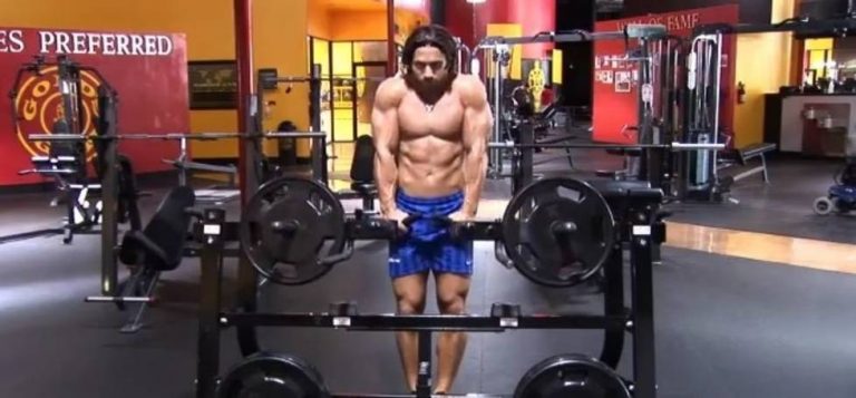 Machine shrug • Bodybuilding Wizard