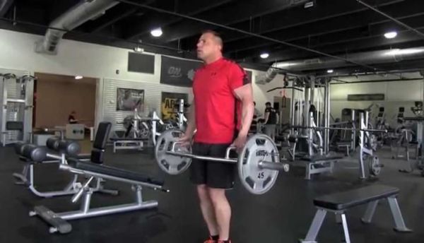 Machine shrug • Bodybuilding Wizard