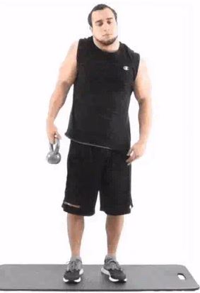 Dumbbell Shrug: Technique, Benefits, Variations & Trap Development Guide